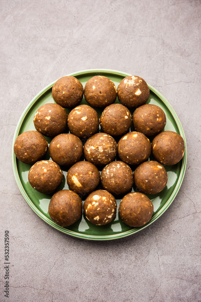 Fenugreek or methi ke Laddu, laddo or laddoo or sweet mithai balls for ...