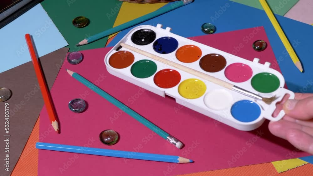 Female Hands Putting a Palette of Watercolors on the Table for Drawing ...