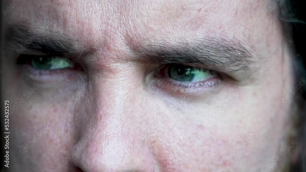 Video Stock Man's gaze looking around. Extreme close up of green eyes ...