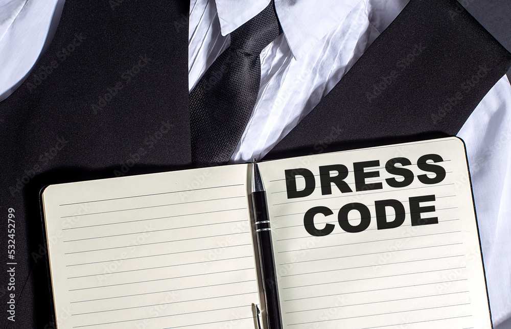 DRESS CODE text on notepad with black and white clothes Stock Photo ...
