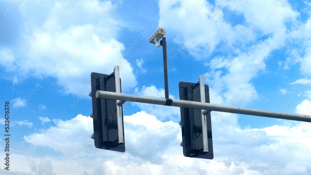 Beside view of dual panel traffic light with centralized surveillance ...