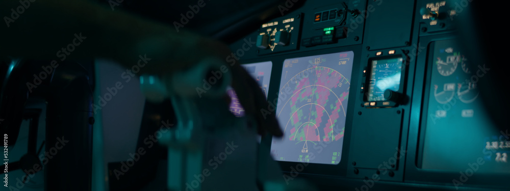 CU on airplane weather radar screen inside the cockpit, aircraft going ...