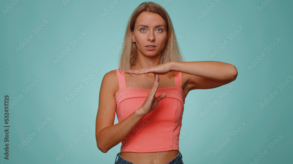Tired serious upset woman 20 years old showing time out gesture, limit ...