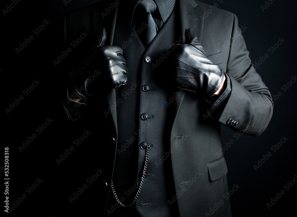 Foto de Portrait of Mysterious Man in Black Suit and Gloves. Concept of ...