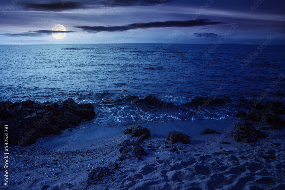 minimalistic seascape in summer at night. beach sea and horizon in full ...