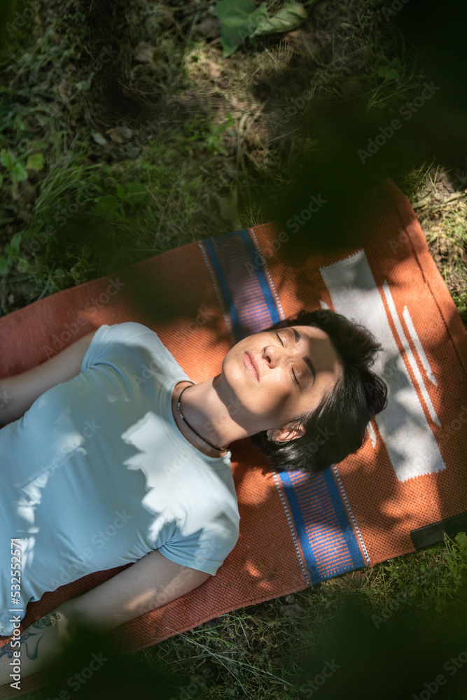 Yoga instructor demonstrates and revels in the Corpse Pose Stock Photo ...
