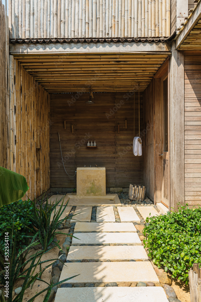 Tropical rain shower open bathroom Outdoor shower with wood Stock Photo ...