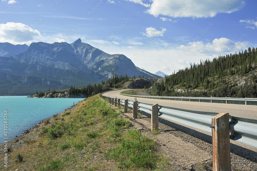 Abraham lake in the mountains of Alberta shown from metal barrier ...