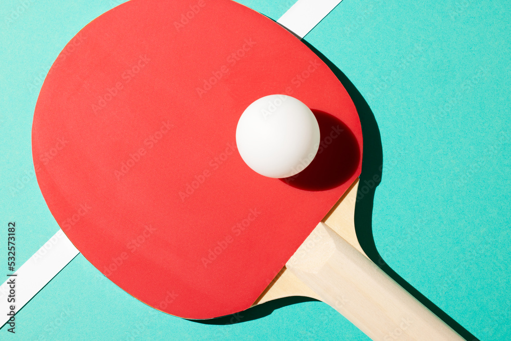 Ping pong racket and ball Stock Photo | Adobe Stock