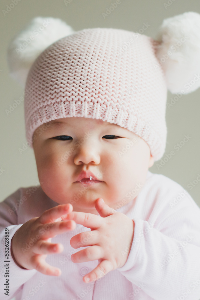 Baby bringing hands together Stock Photo | Adobe Stock