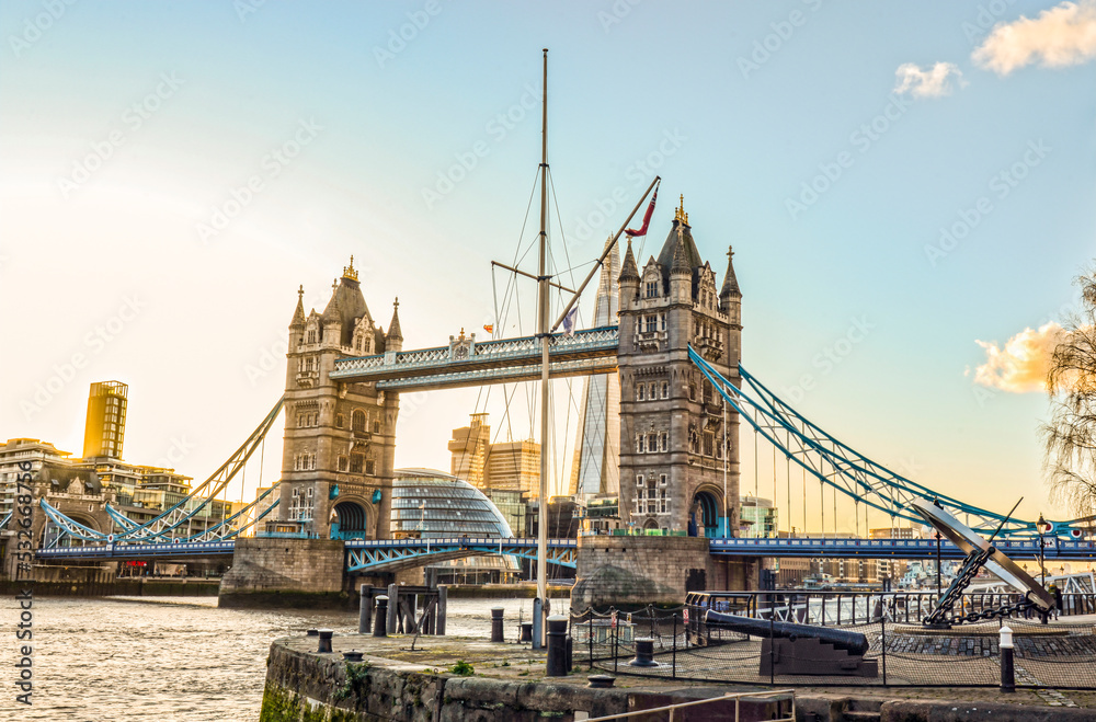 Tower Bridge is a Grade I listed combined bascule and suspension bridge ...
