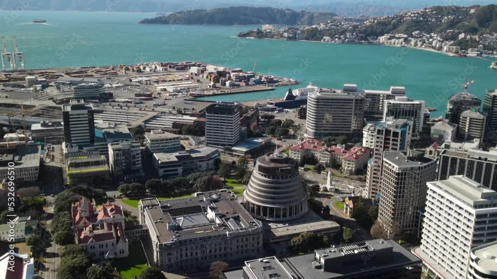 Beehive in Wellington. Aerial pull back from famous parliament building ...
