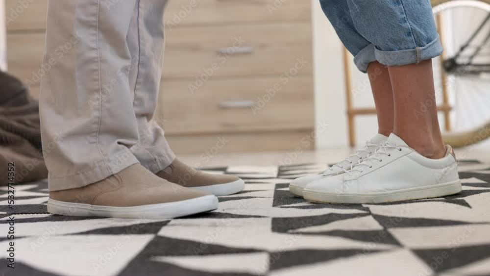 Couple, shoes and closeup of adult feet with the woman on her tiptoe to ...