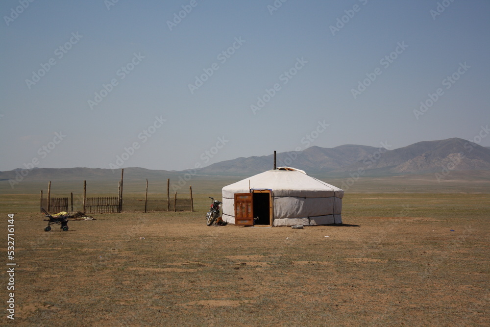 Foto de A nomadic tent (ger) in the evening silence of the huge steppe ...