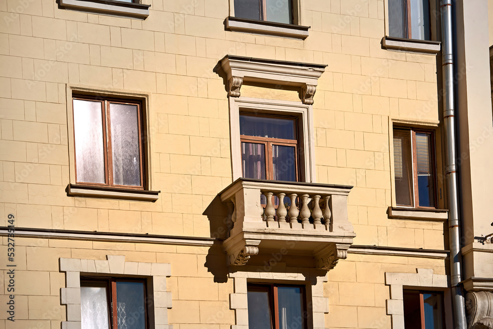 Balcony with with balustrade, old residential building. Stalinist ...