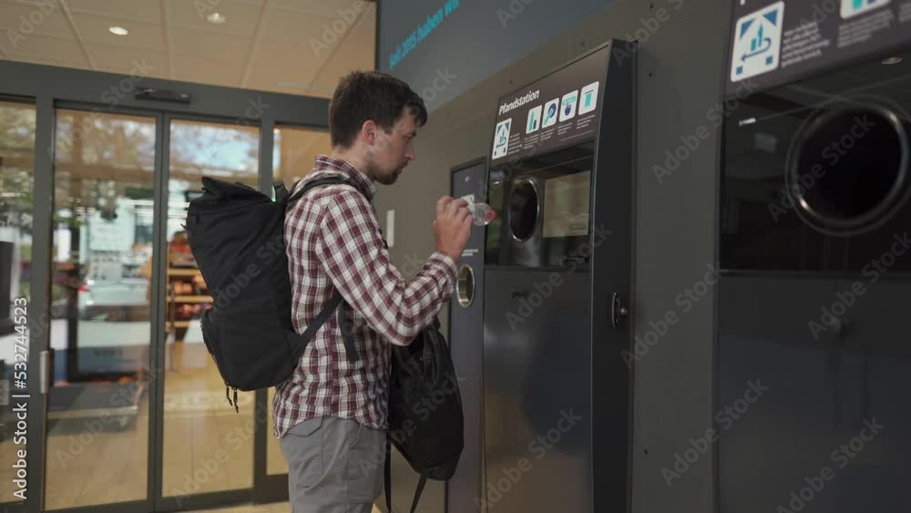 Male returns plastic bottles, reusable containers to reverse vending ...