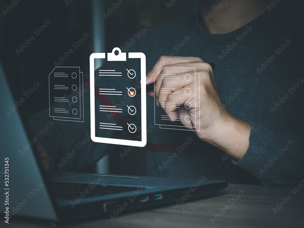 digital questionnaire Man's hand showing check mark on virtual window ...