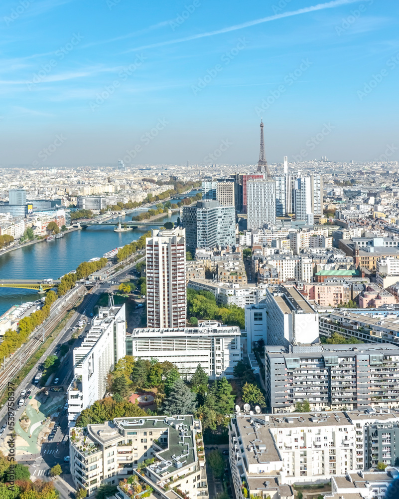 Aerial view of Paris city with the Eiffel tower and the Seine river ...