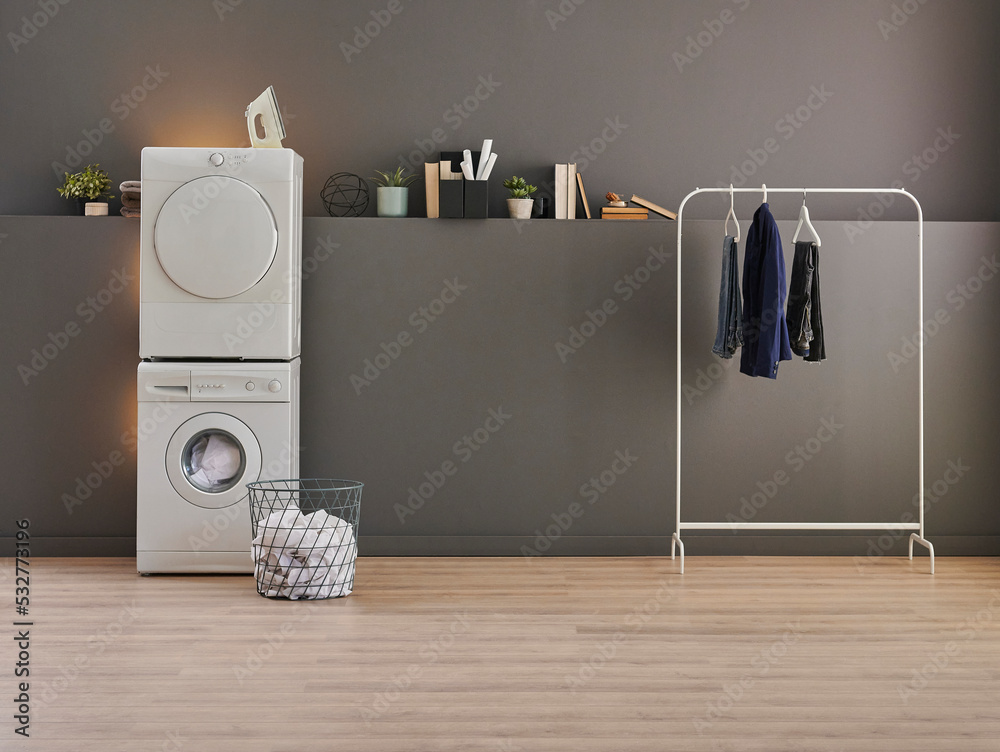 Washing and drier machine in the grey wall room background, laundry ...