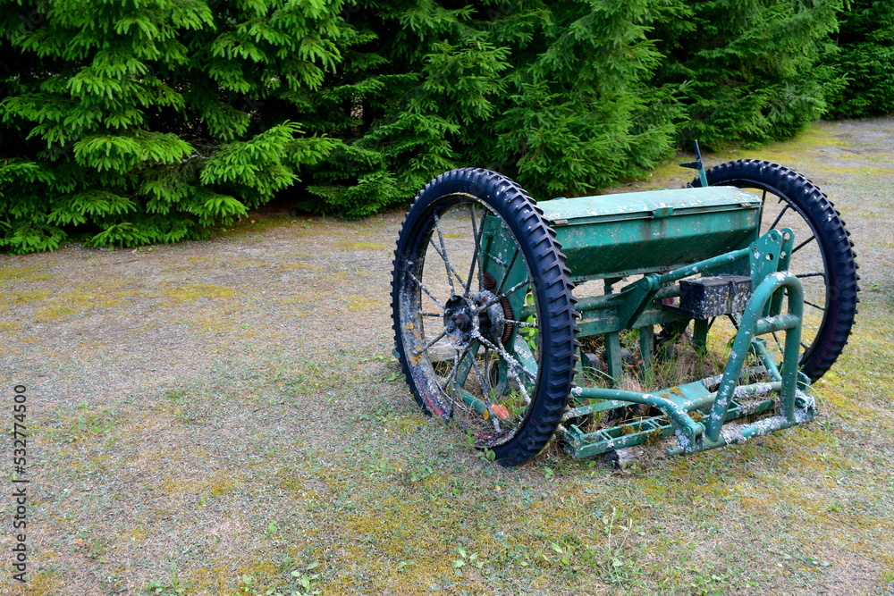 A close up on an old ploughing machine used by peasants and farmers ...
