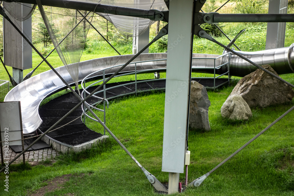 A slide from the observation tower with a safety net Stock Photo ...