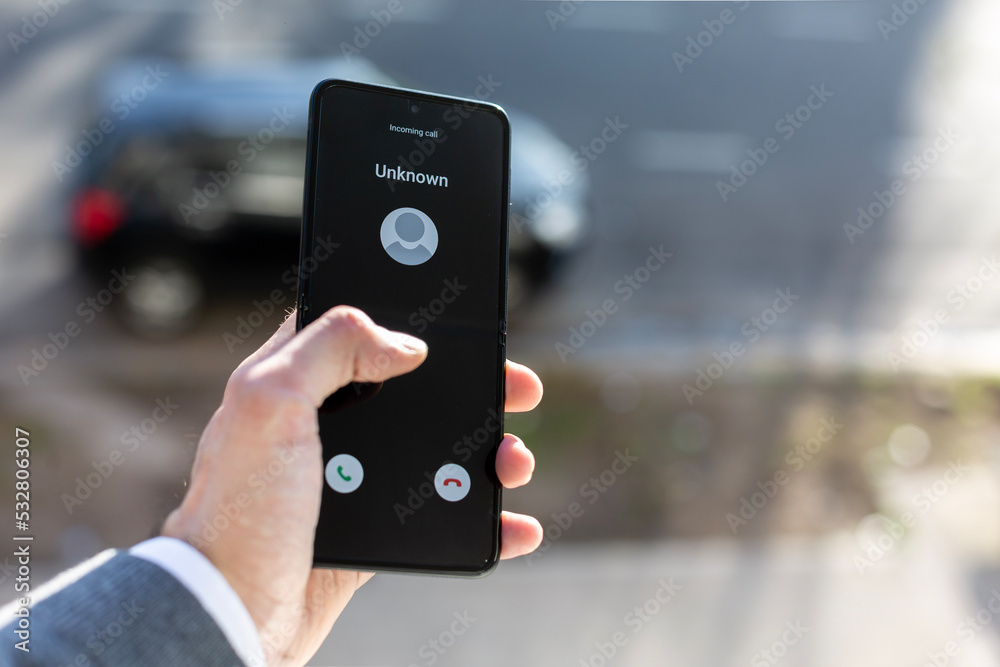 Phone call from unknown number. Scam, fraud or phishing with smartphone ...