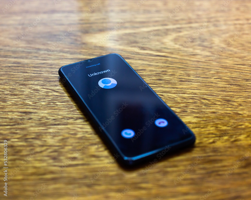 Phone call from unknown number. Scam, fraud or phishing with smartphone ...