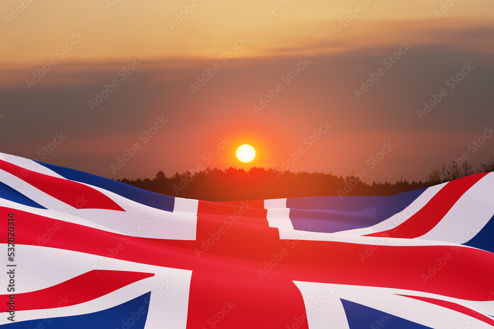 National flags of United Kingdom on sunset sky background. Background ...