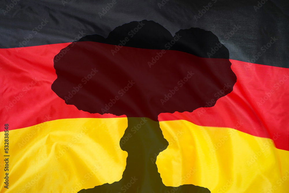 Atomic bomb explosion mushroom on Germany flag background. Nuclear ...