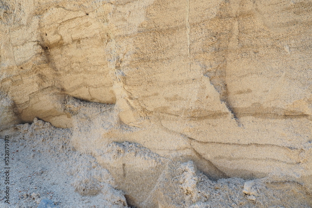 Sandstone is a fragmentary sedimentary rock, a homogeneous or layered ...