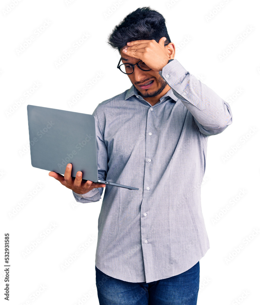 Handsome latin american young man working using computer laptop ...