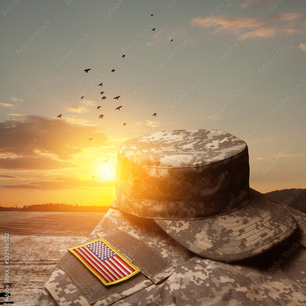 Poster USA military uniform with insignias on old wooden table on ...