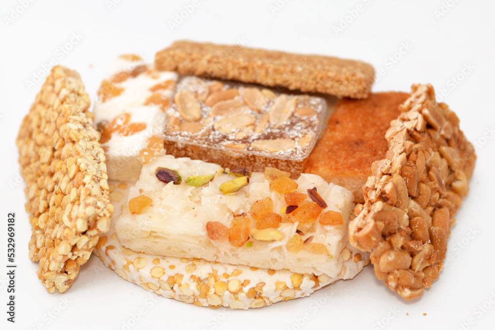 collection of Eastern candy chickpeas, peanuts, sesame taffy, coconut ...