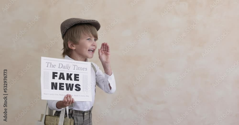 Newsboy shouting against concrete wall background. Boy selling fake ...