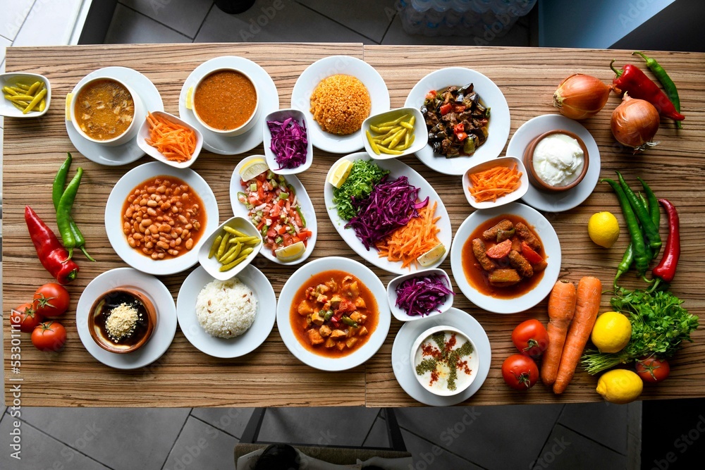 Table scene of assorted take out or delivery foods. Traditional Turkish ...