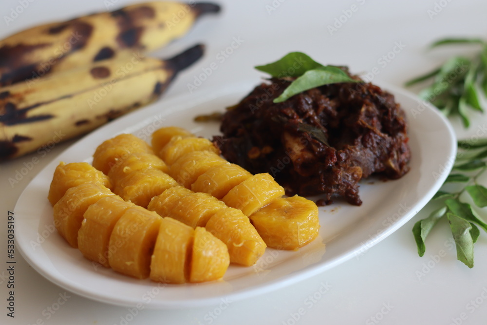 Mutton roast and steamed ripe plantain. A spicy and sweet combination ...