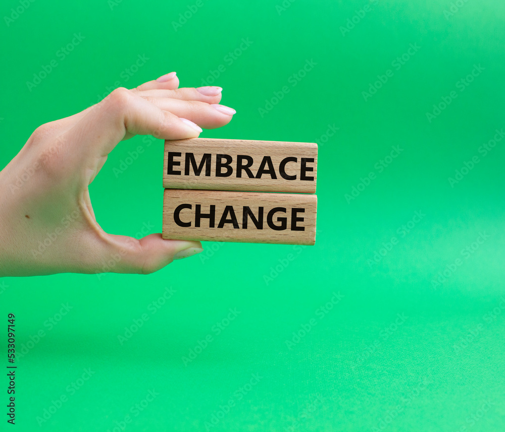 Embrace change symbol. Concept word Embrace change on wooden blocks ...