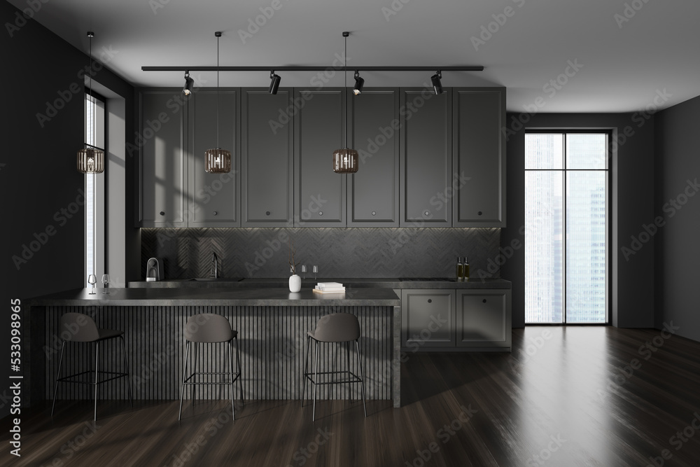 Grey kitchen interior with bar countertop and seats, kitchenware and ...
