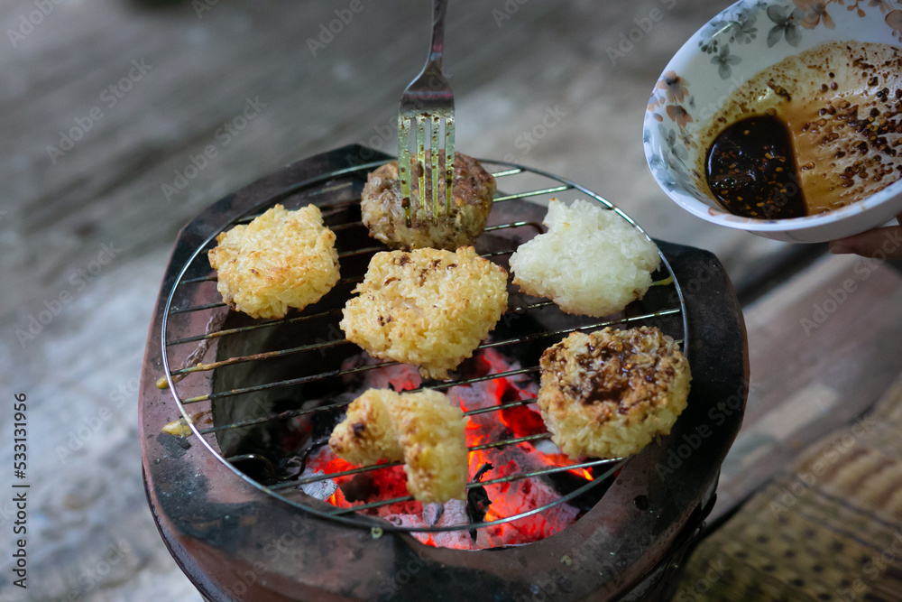 Khao jee a street food Thai style grill sticky rice, with egg paste ...