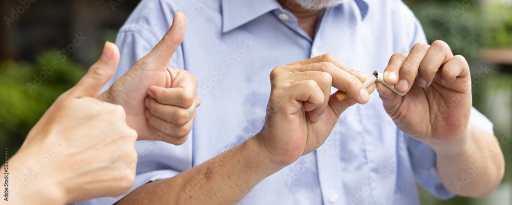 Header crop of old senior man quit smoking, getting approving thumb up ...