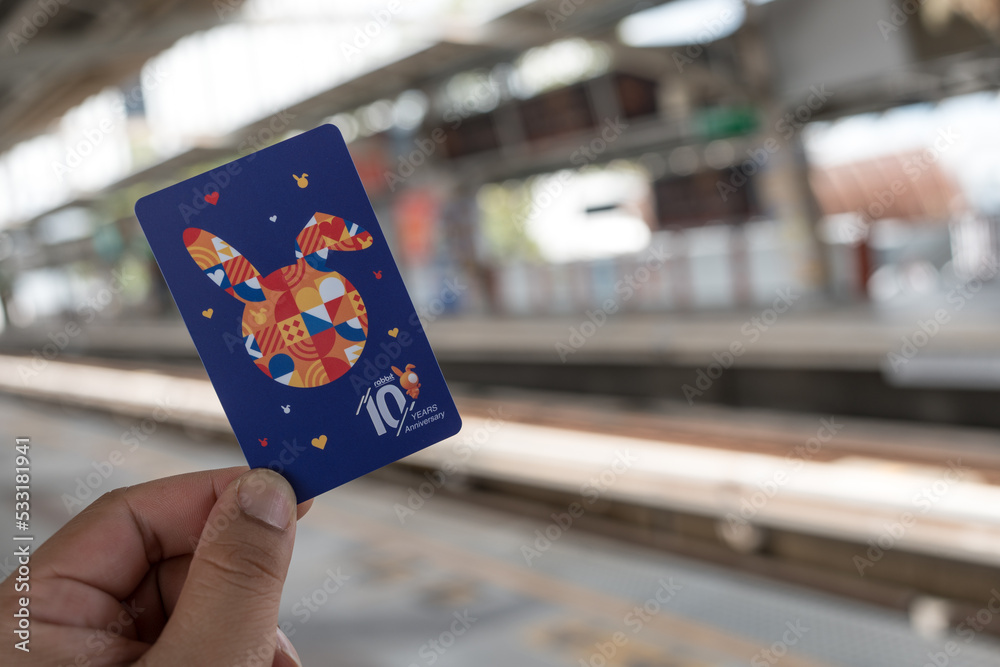 Bangkok, Thailand - Setember 25, 2022 : Commuter holding a pecial ...