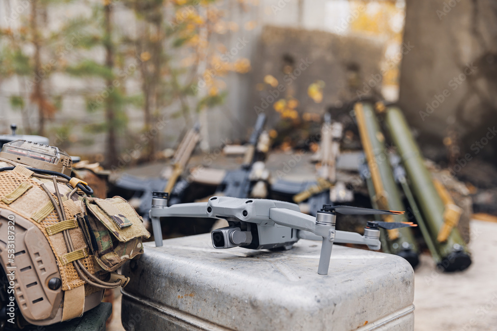 Modern army soldiers using aerial drone for artillery guidance and ...