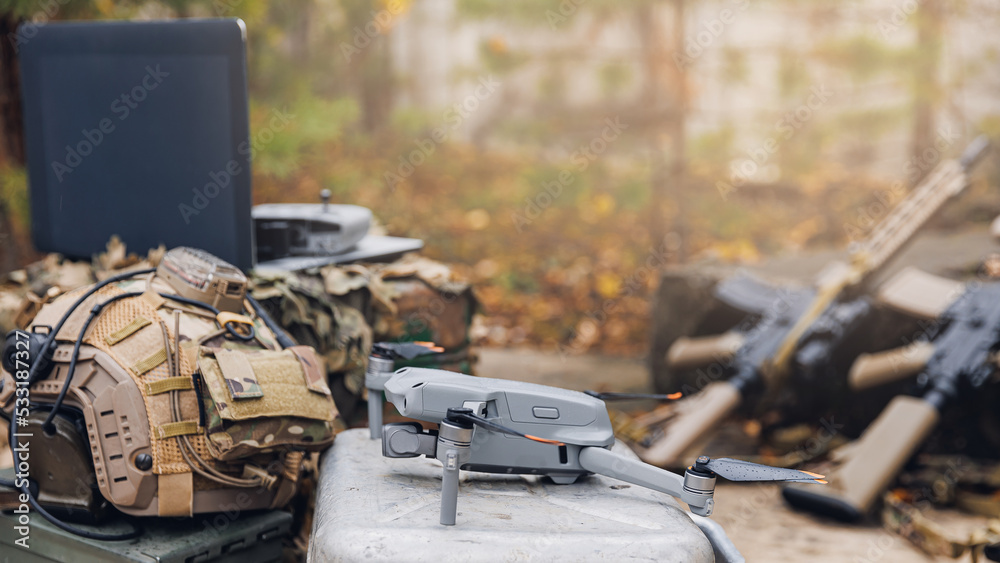 Concept use modern Quadcopter air robot in military tasks. Army drone for reconnaissance ...