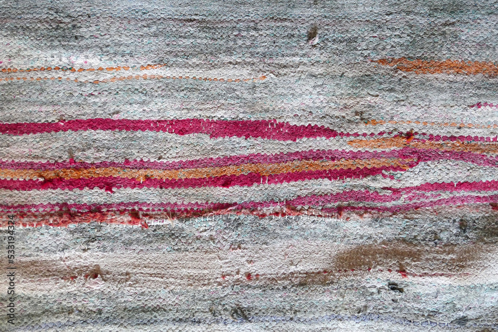 classic old sackcloth-carpet laid on the floor of the village house ...