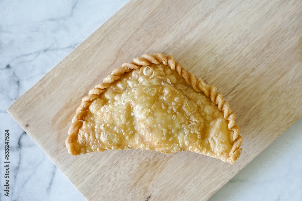 Cornish pasty filled with chicken and potato. Pastry minced pie or ...