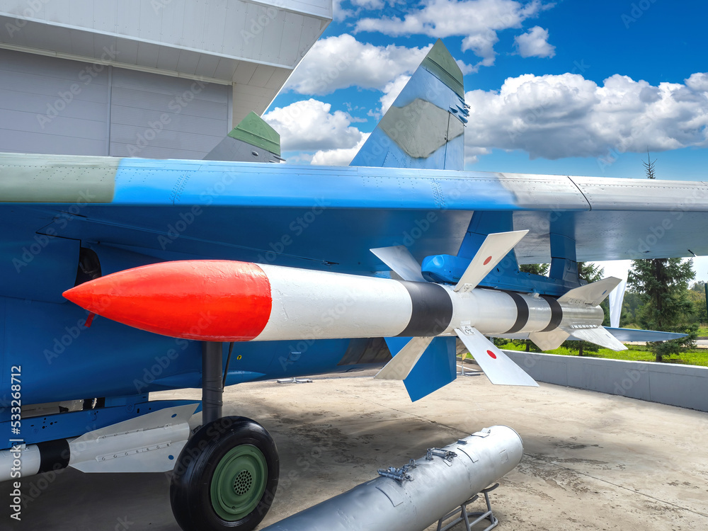 Cruise missile. Rocket under wing of aircraft. Fighter fragment ...