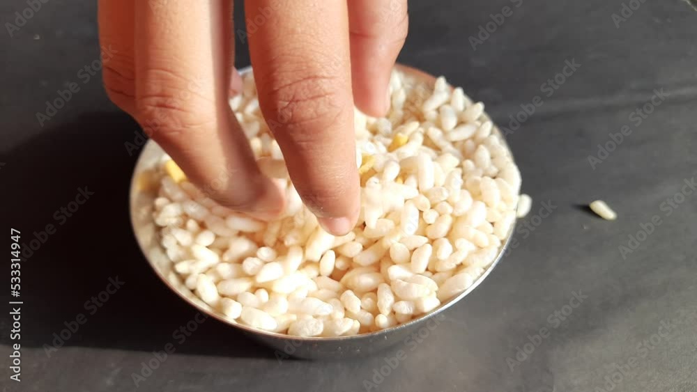 Puffed rice or popped rice. Its puffed grain made from rice. A ...