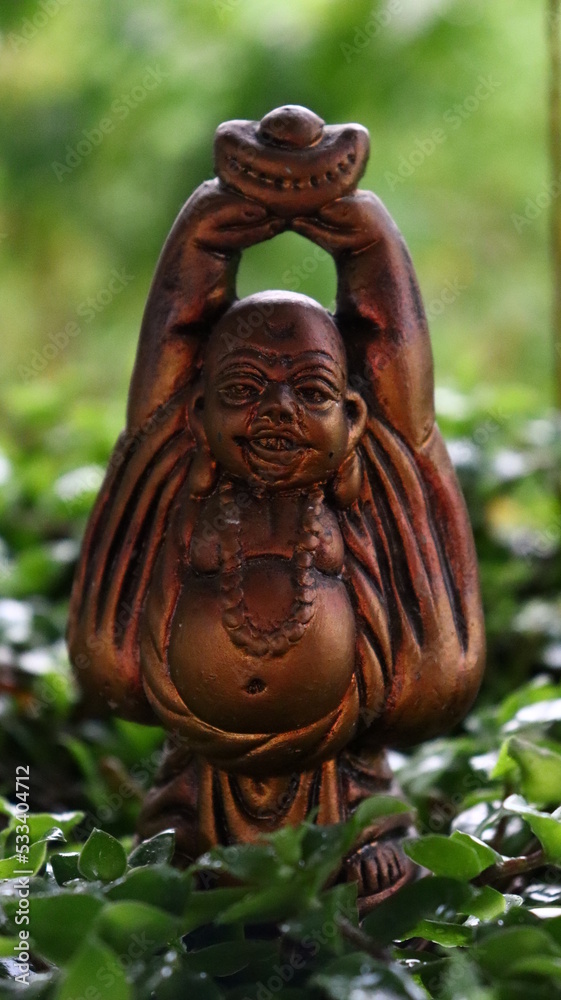 Laughing Buddha Stock Photo | Adobe Stock