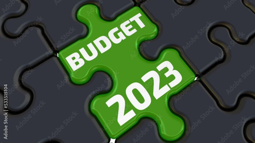 Budget 2022 and budget 2023. The text on the puzzles. Folded black ...