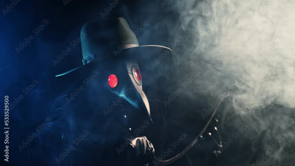Plague doctor with sharp sickle isolated on blue smoke background ...